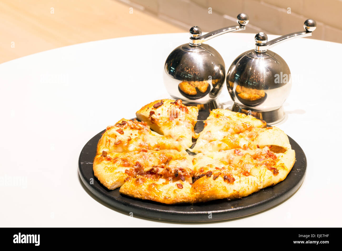 French Pizza with bacon and cheese Stock Photo - Alamy
