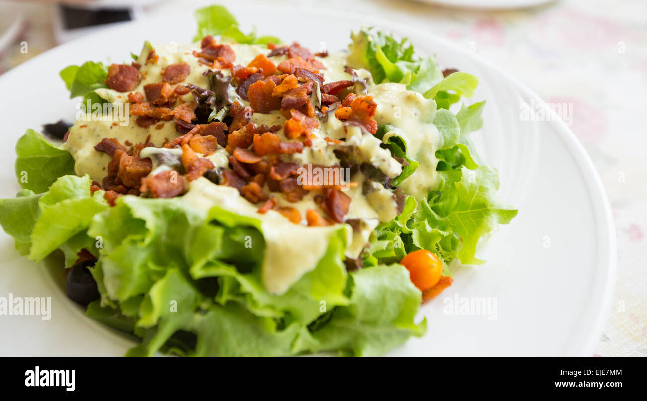 Ceasar Salad with bacon bit Stock Photo - Alamy