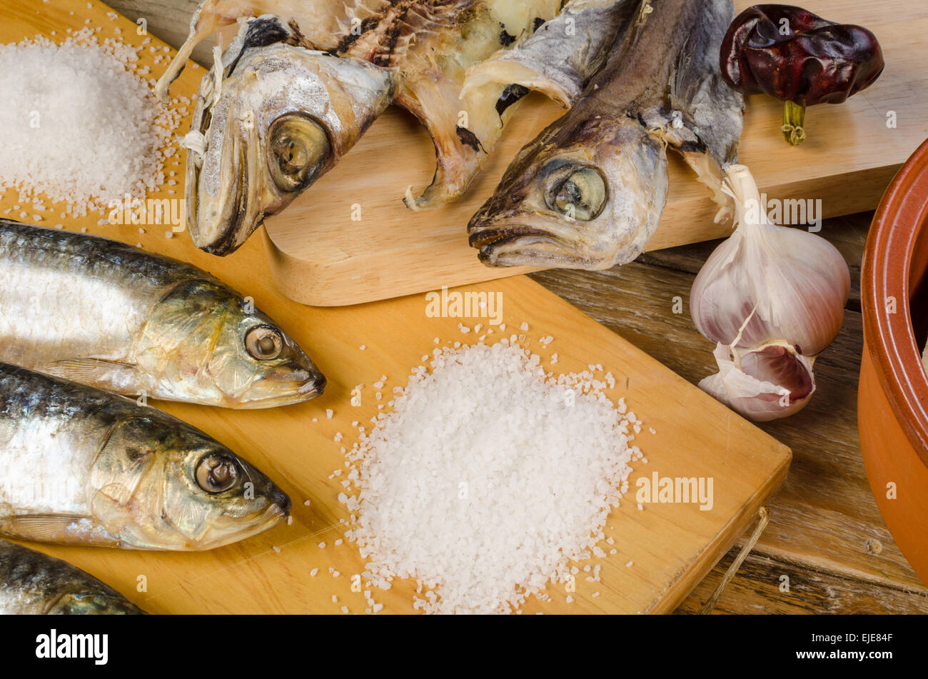 Assorted salt cured fish with ingredients for Mediterranean recipies ...