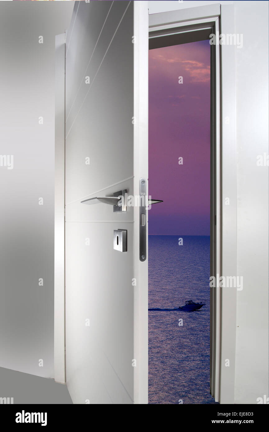 white door open to the sea Stock Photo - Alamy