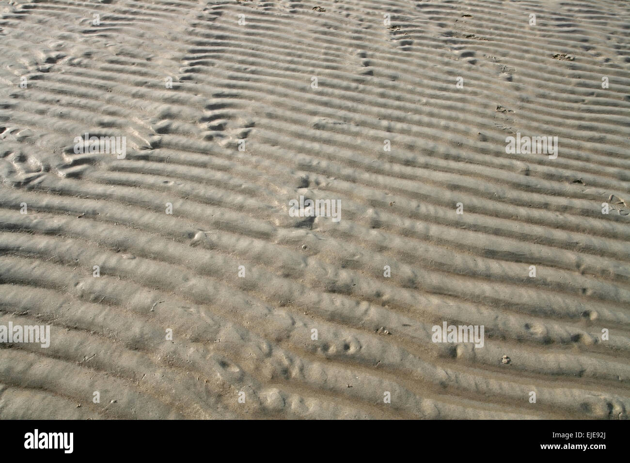 Pattern of sand beach ripple background Stock Photo - Alamy