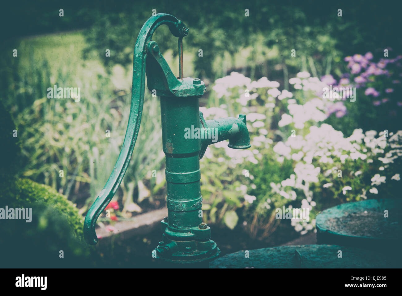 Old water pump outside stone hi-res stock photography and images - Alamy