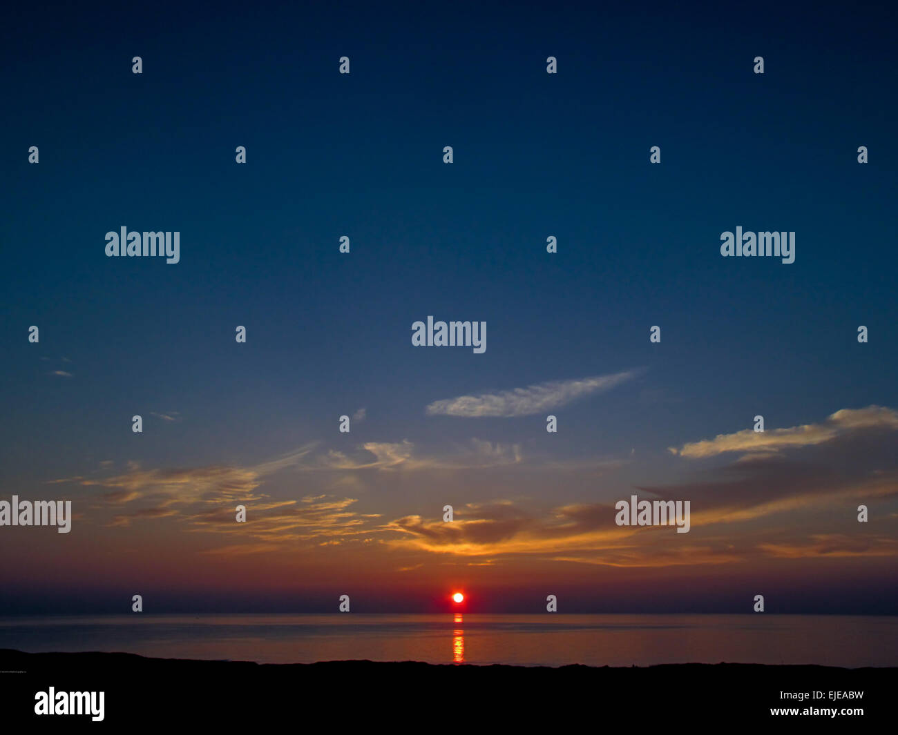 sunset over the Atlantic Ocean from the west side of Cape Breton, Nova ...