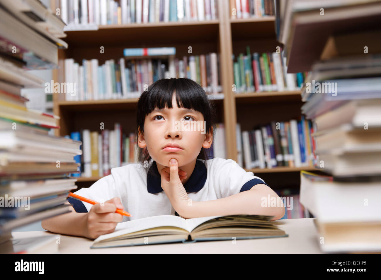 Indian school girl student thinking hi-res stock photography and images ...