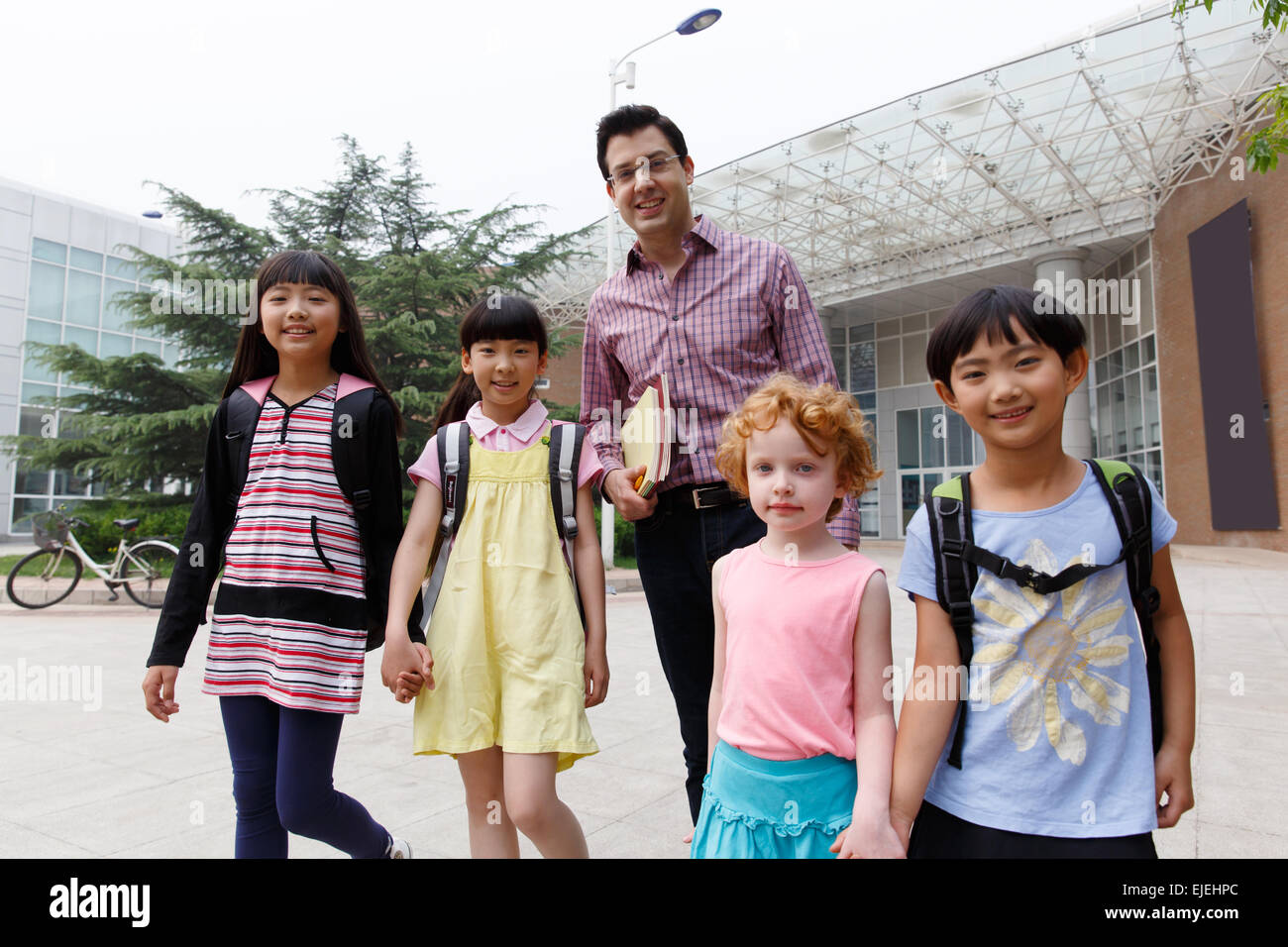 The international primary school teachers and students Stock Photo - Alamy