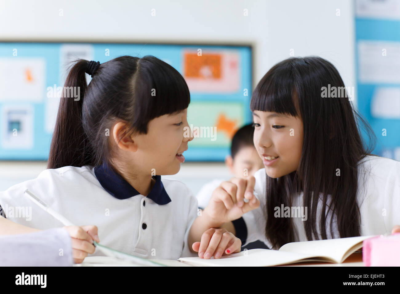 Two School Girls Writing High Resolution Stock Photography and Images ...