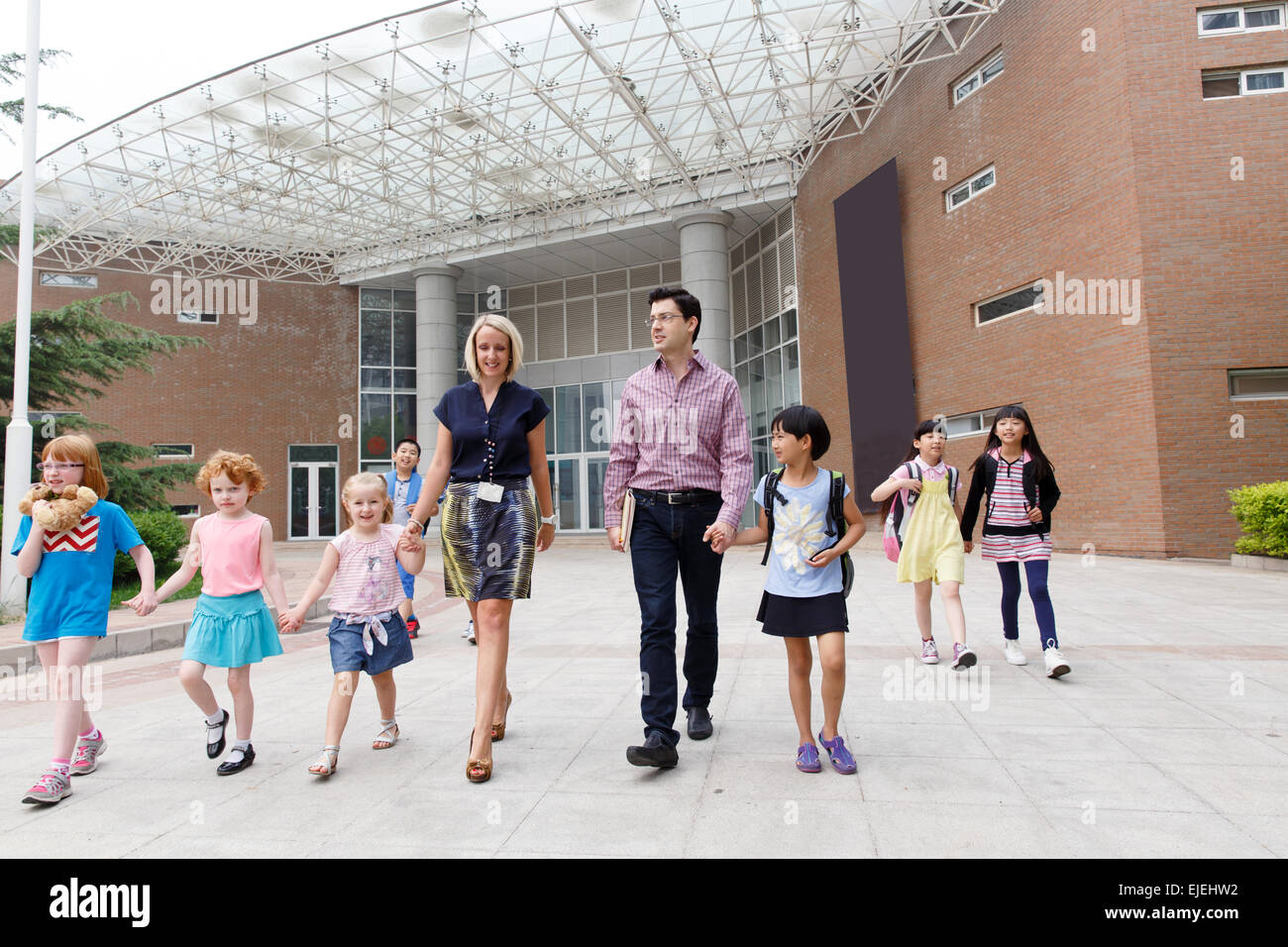 The international primary school teachers and students Stock Photo - Alamy