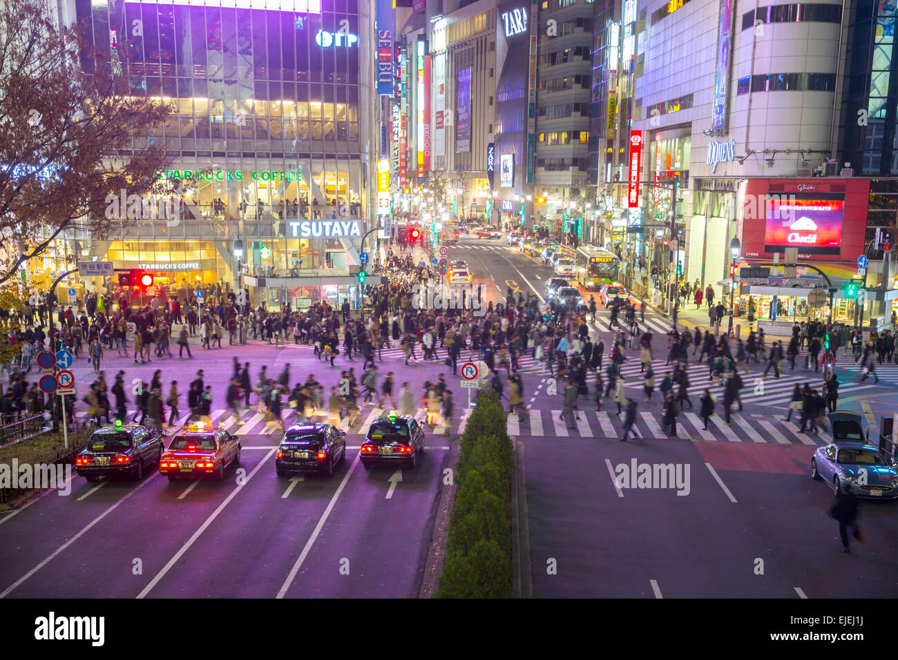TOKYO - DECEMBER 10: Pedestrians cross at Shibuya Crossing on December ...