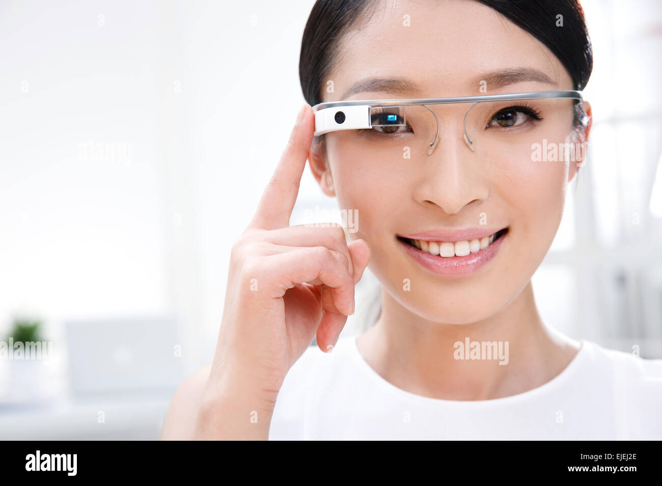The young business women wearing Google glasses Stock Photo - Alamy