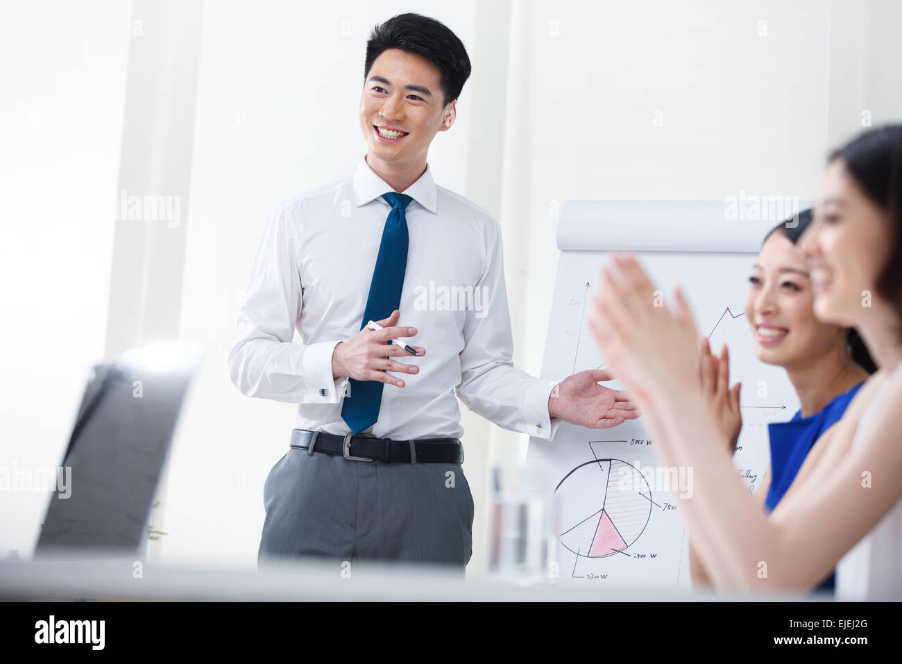 Indian business people standing clapping hi-res stock photography and ...