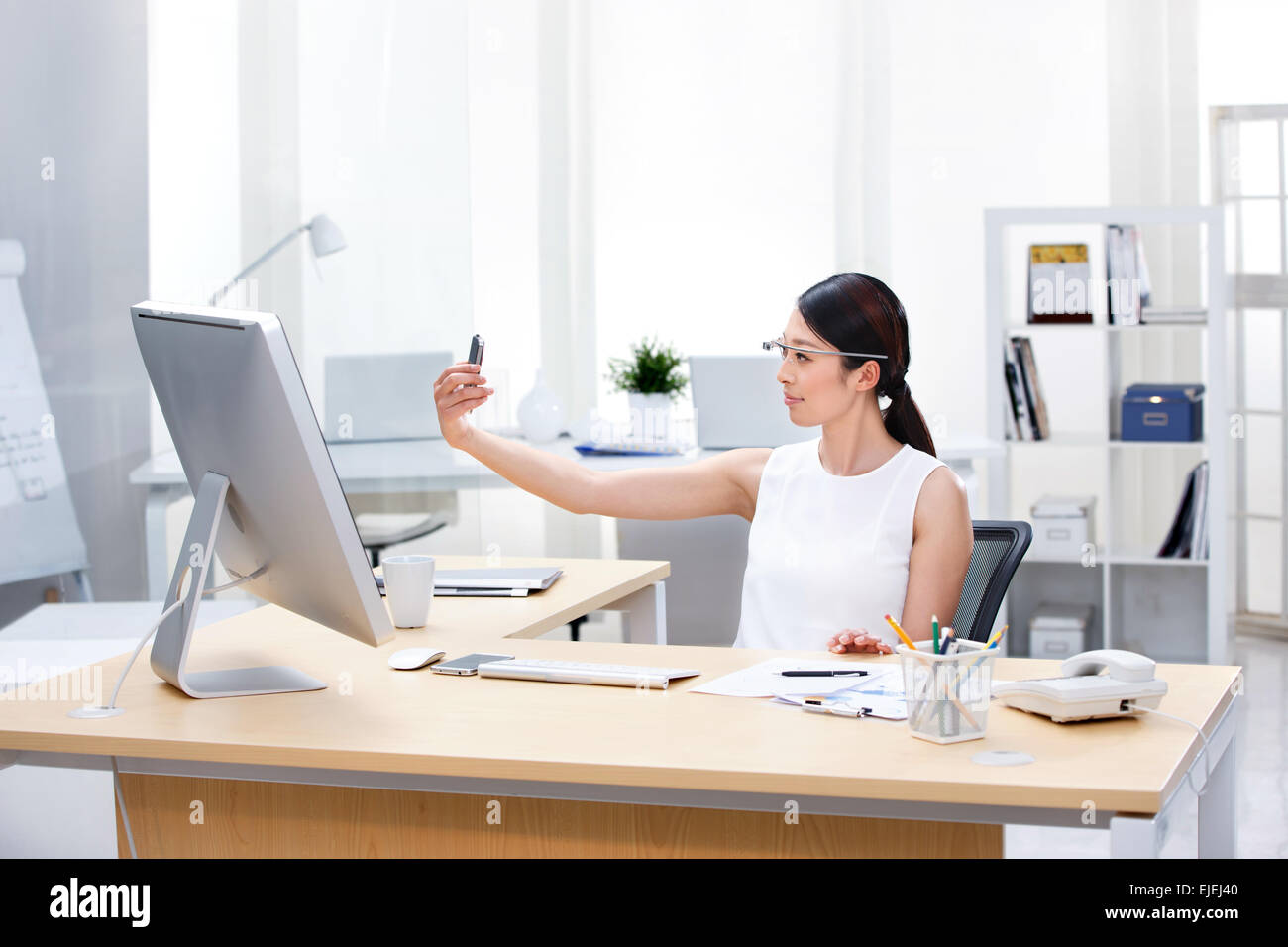 The young business women wearing glasses Google autodyne Stock Photo ...