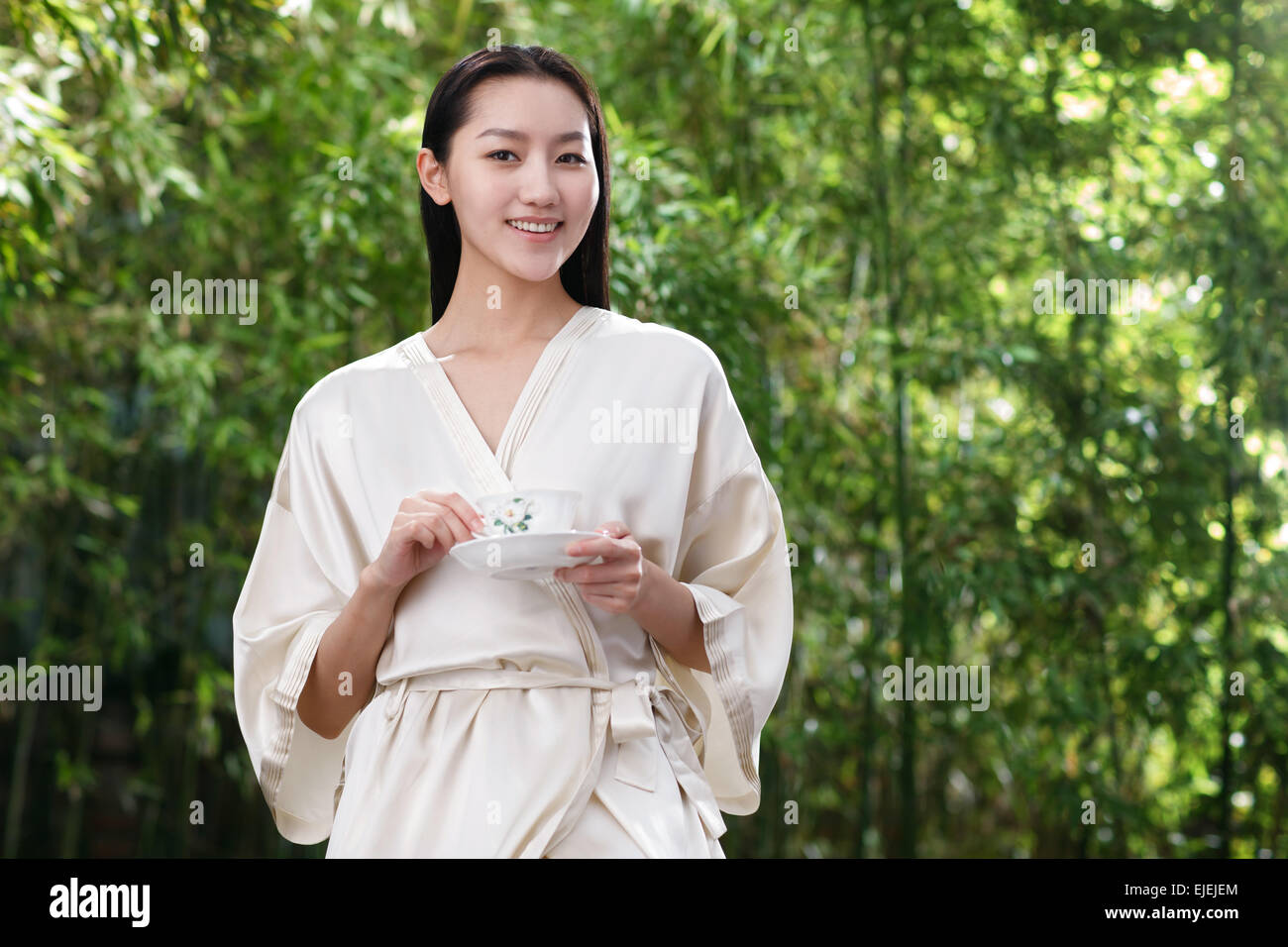 Black robe holding hi-res stock photography and images - Alamy