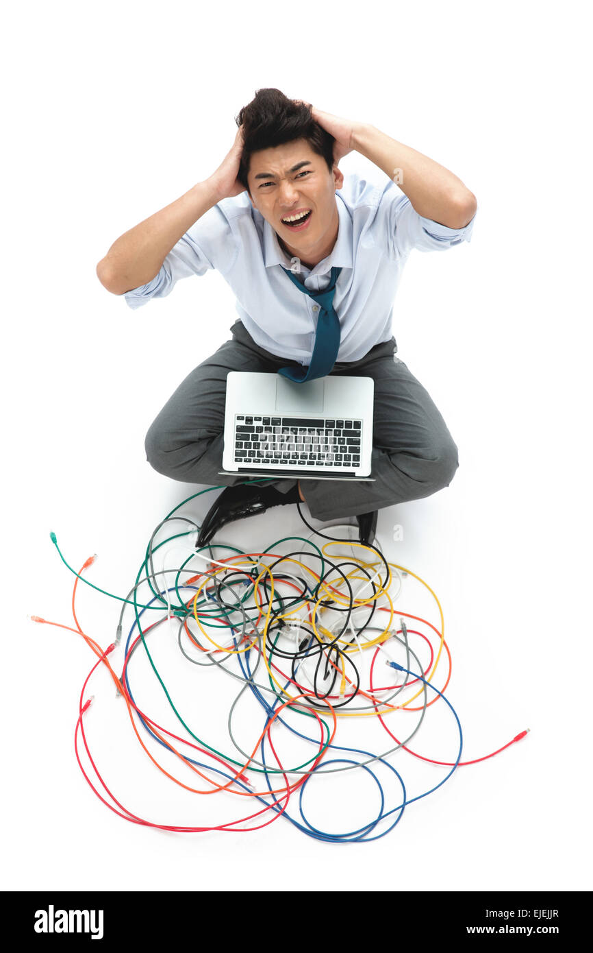 Office worker scratching head hi-res stock photography and images - Alamy