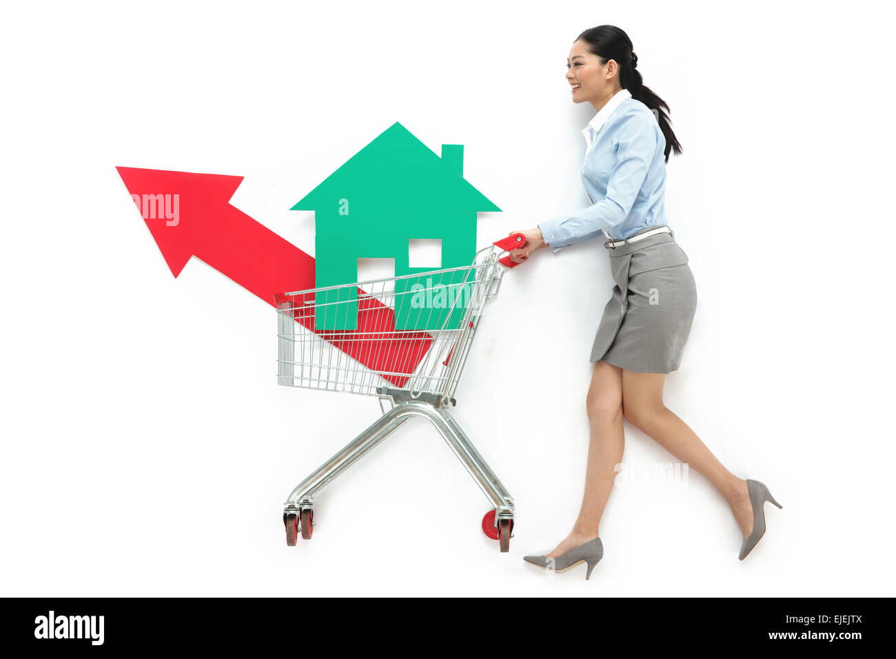 Woman pushing shopping cart side view hi-res stock photography and ...