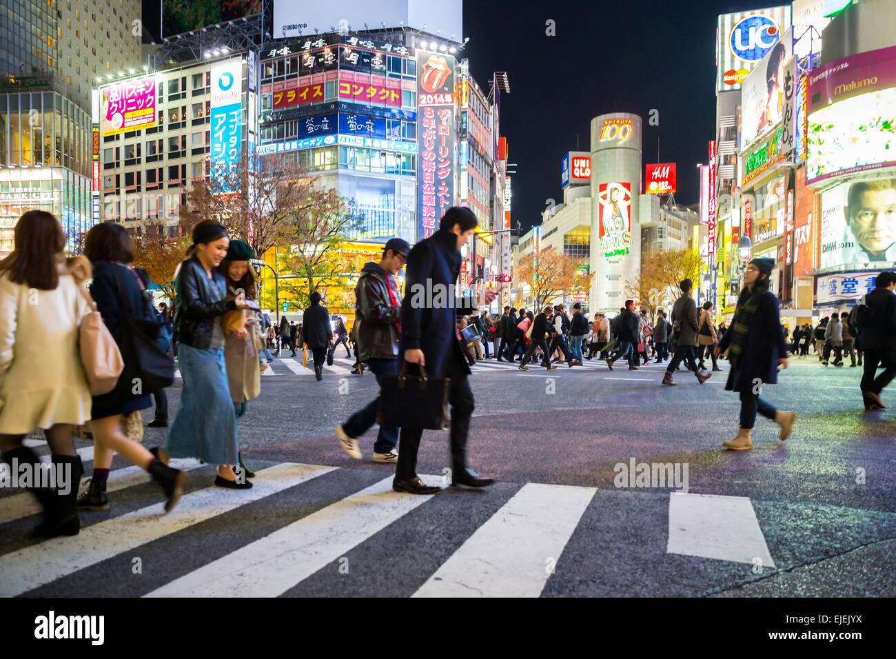 TOKYO - DECEMBER 10: Pedestrians cross at Shibuya Crossing on December ...
