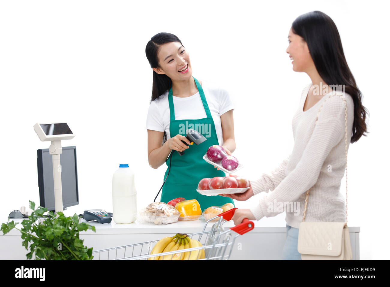 The young woman to pay the cashier Stock Photo - Alamy