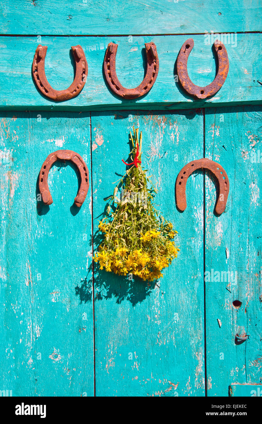 five old rusty luck symbol horseshoe on wall and medical healthy st ...