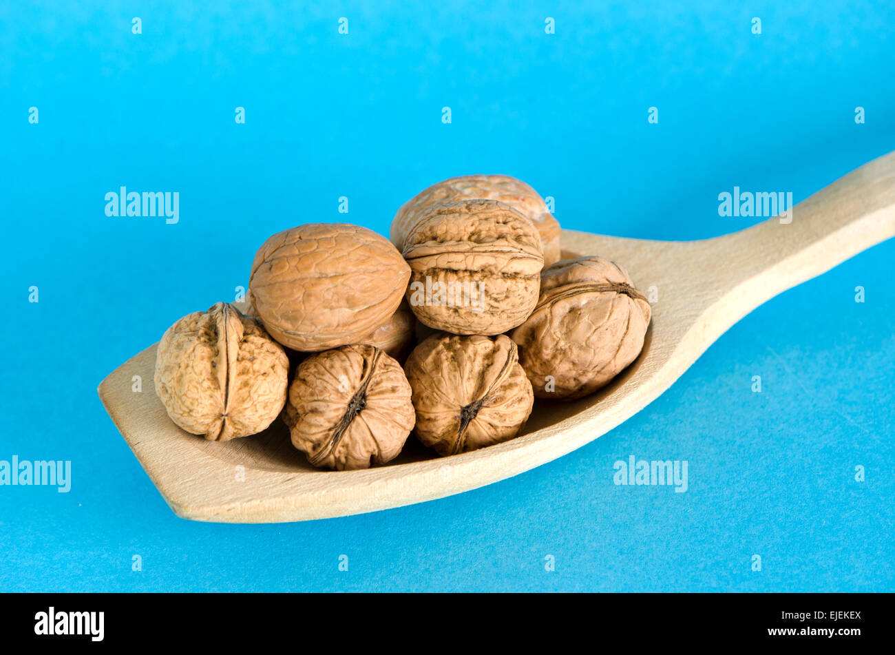 healthy fruit food walnuts in wooden spoon Stock Photo - Alamy