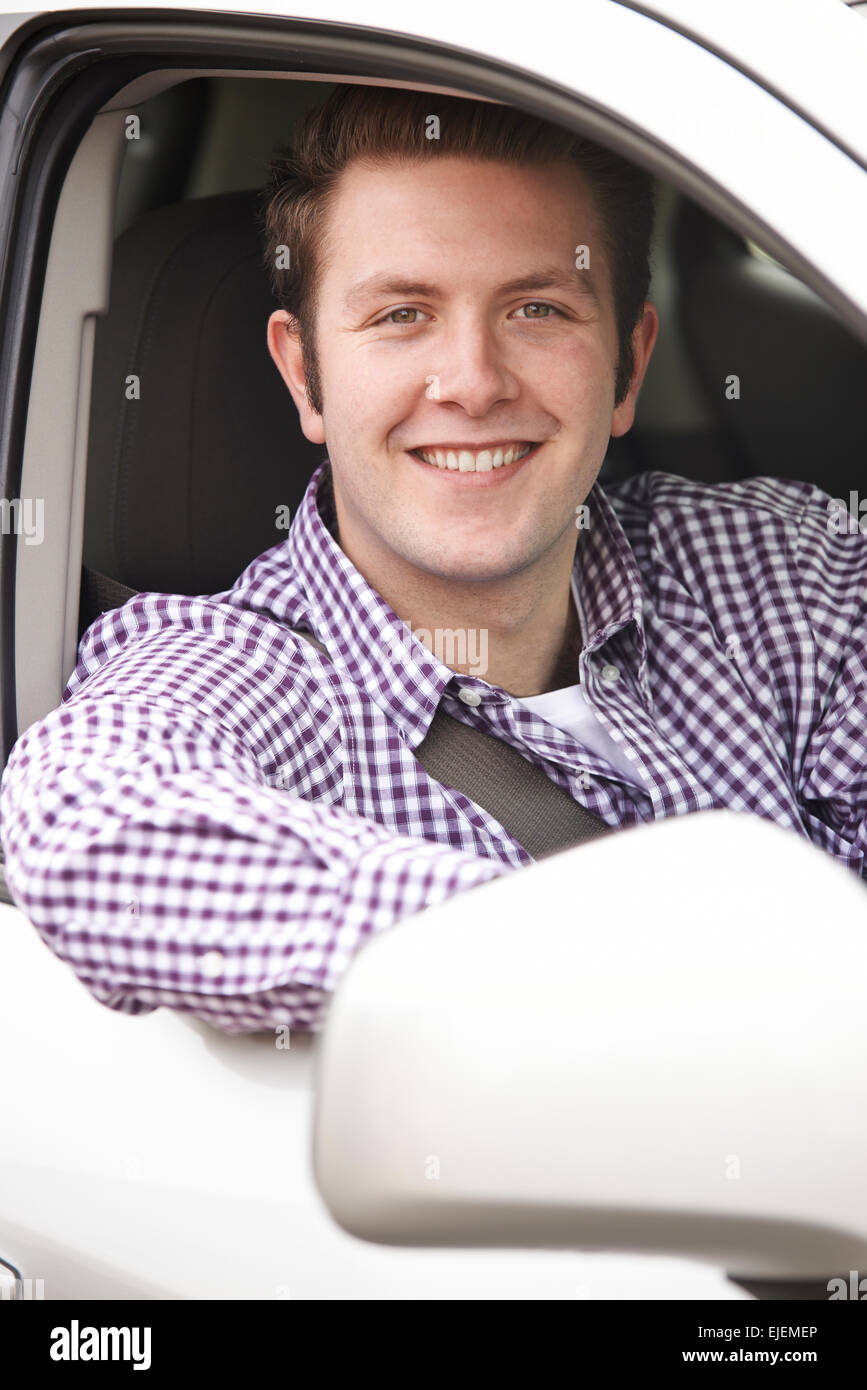 Happy young male driver hi-res stock photography and images - Alamy