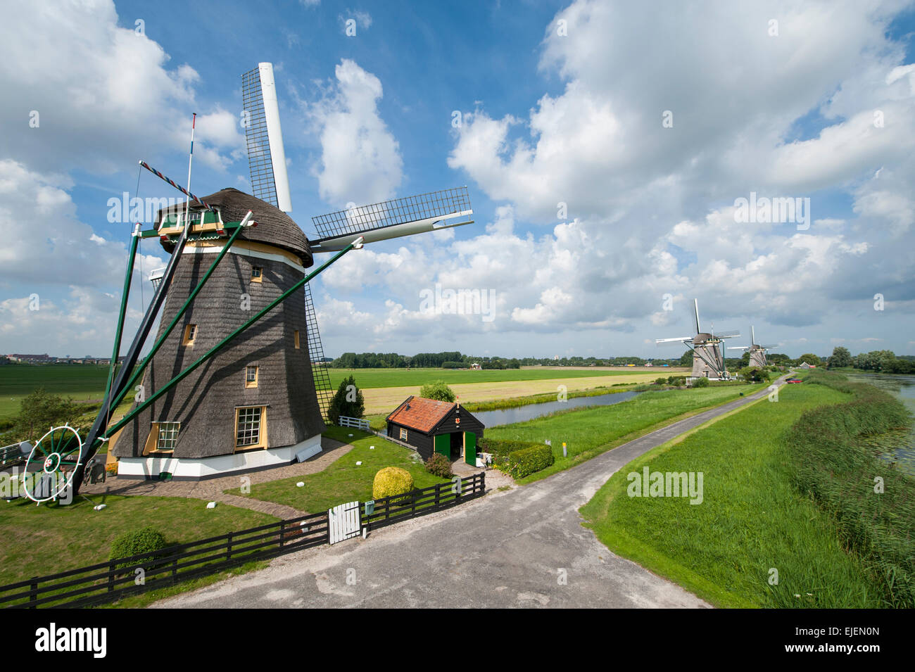 Mill in dutch lowland landscape Stock Photo - Alamy