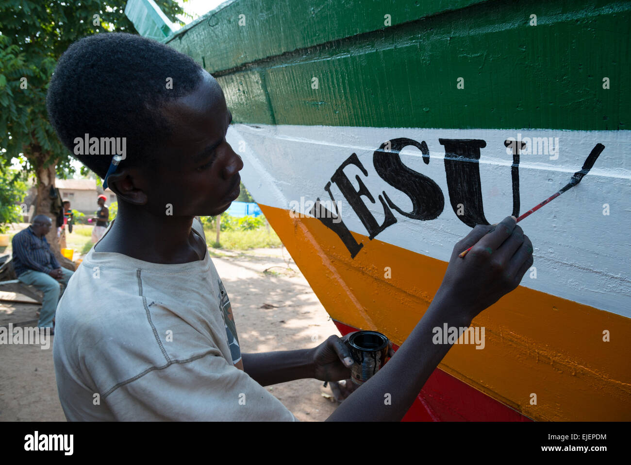 Repainting of a boat. Musoma harbour. Lake Victoria. Tanzania Stock ...