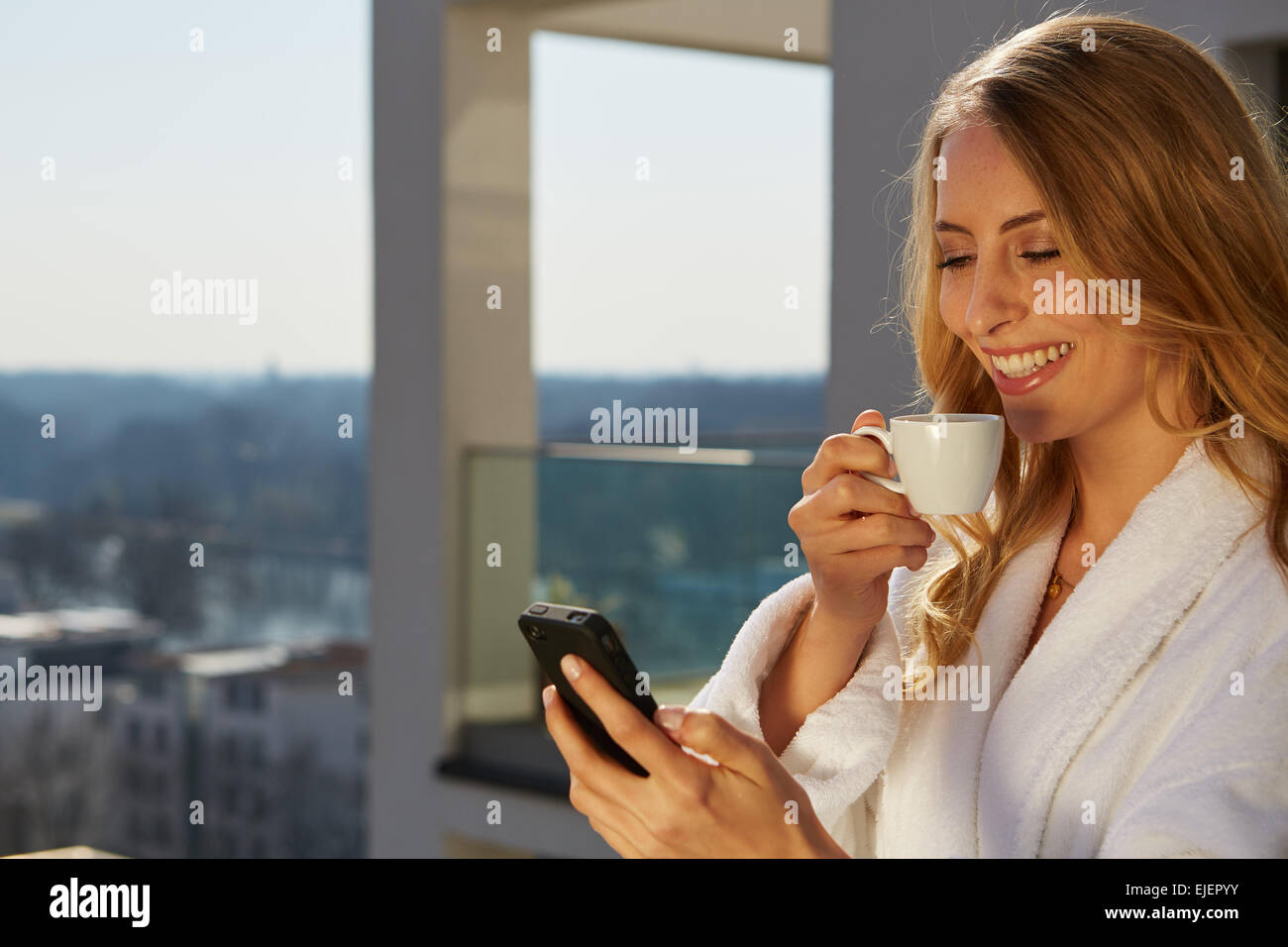 Drinking coffee at home Stock Photo - Alamy