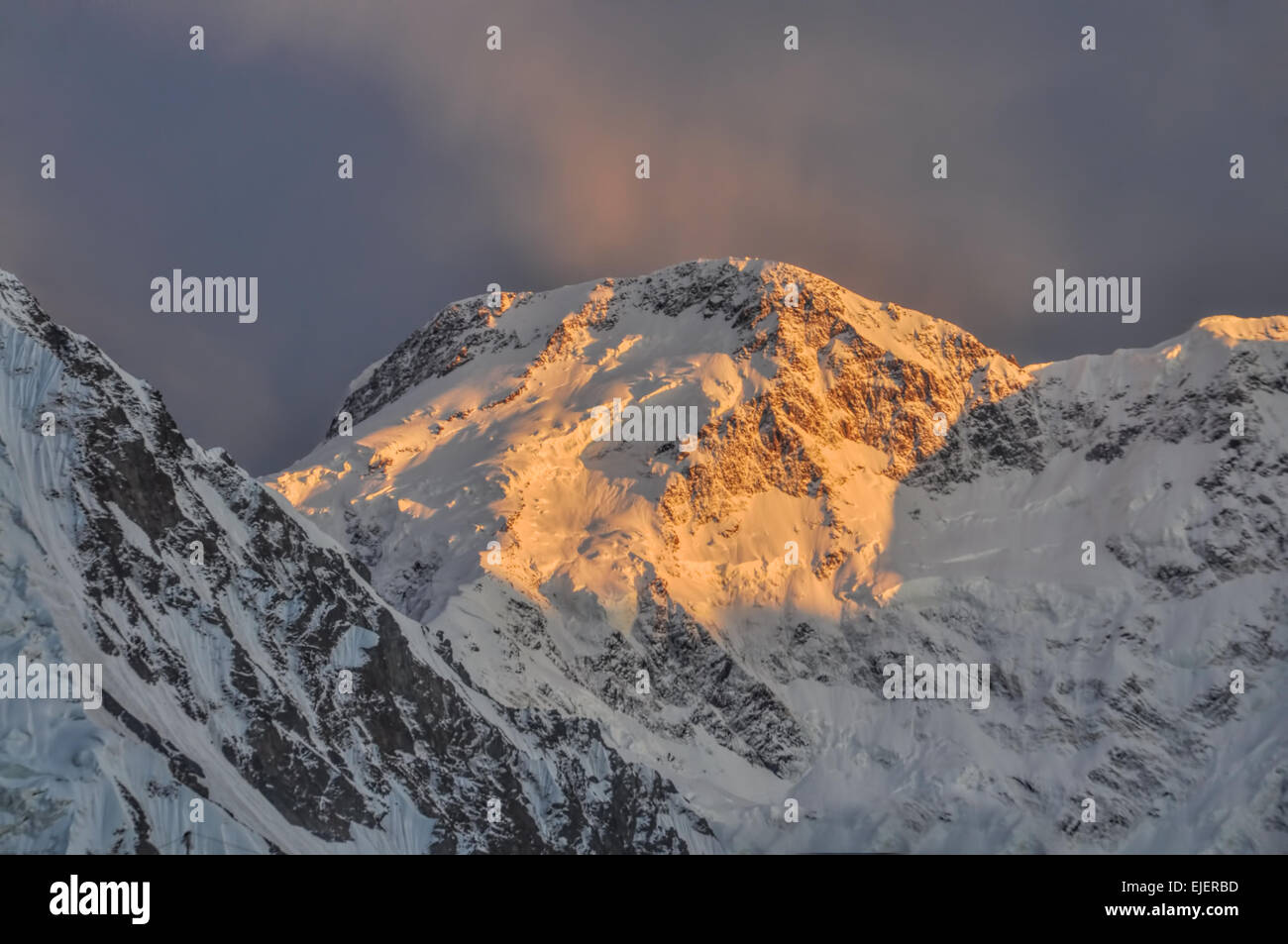 Scenic Pik Pobeda peak lit by early morning sun in Kyrgyzstan Stock ...
