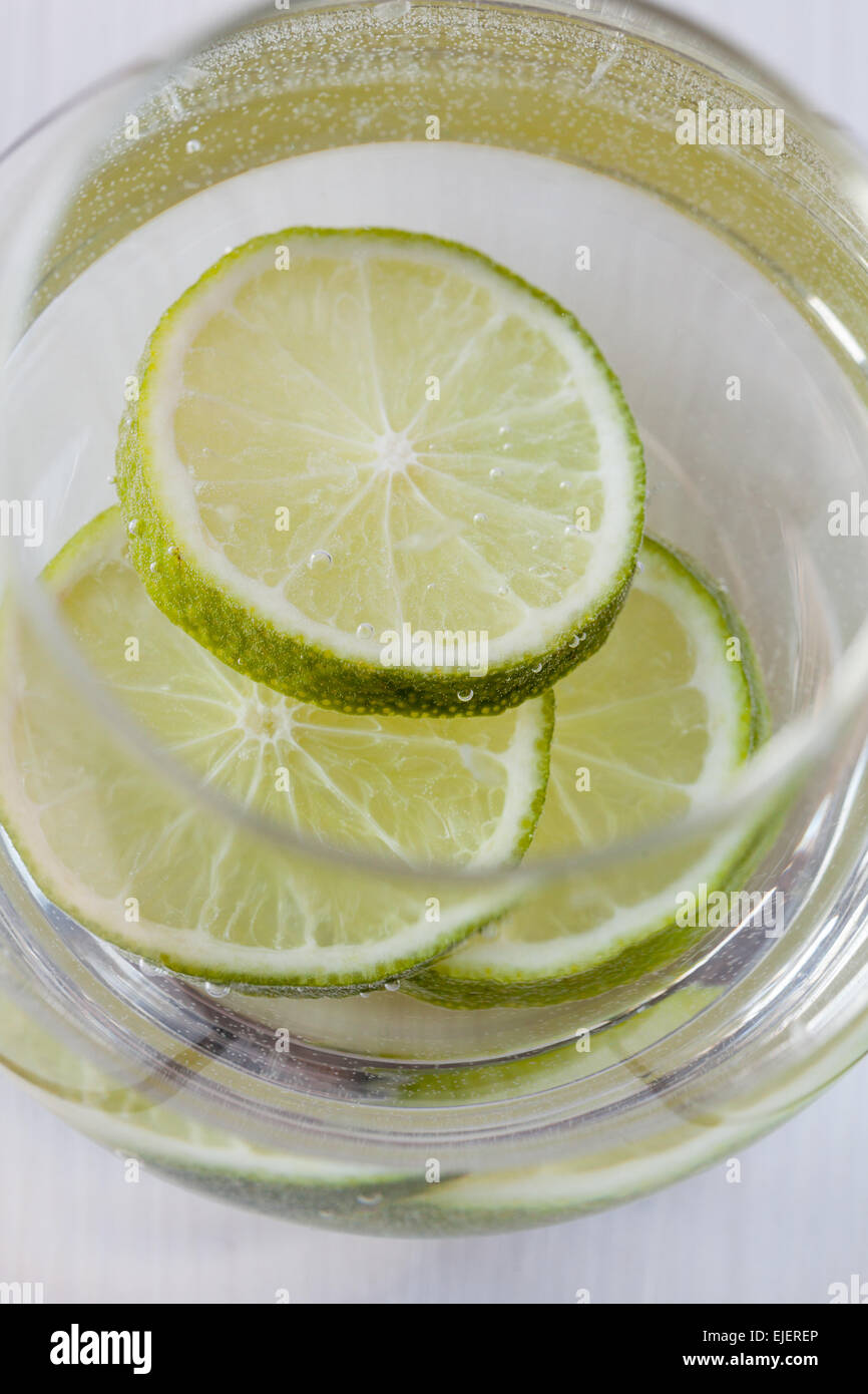 slices of lime in a glass of water from above Stock Photo - Alamy