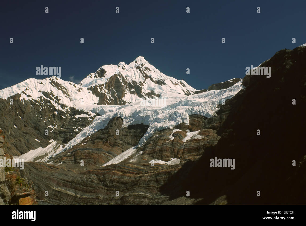 Majestic peak covered by snow in Peruvian Andes, Cordillera Blanca ...