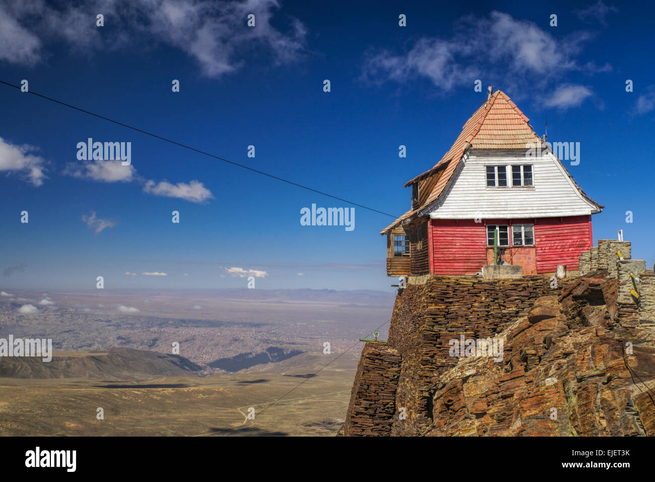 Wooden hut on the edge of cliff on mountain Chacaltaya in south ...