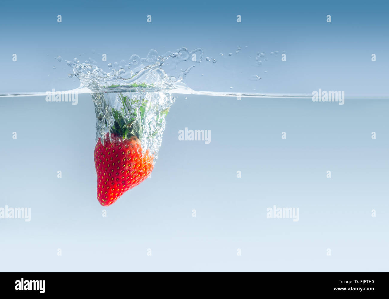 Strawberry in water Stock Photo - Alamy