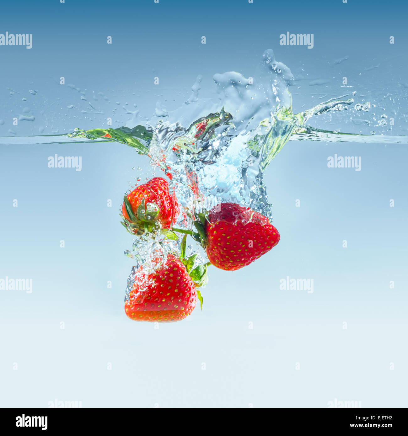 Strawberry's in water Stock Photo - Alamy
