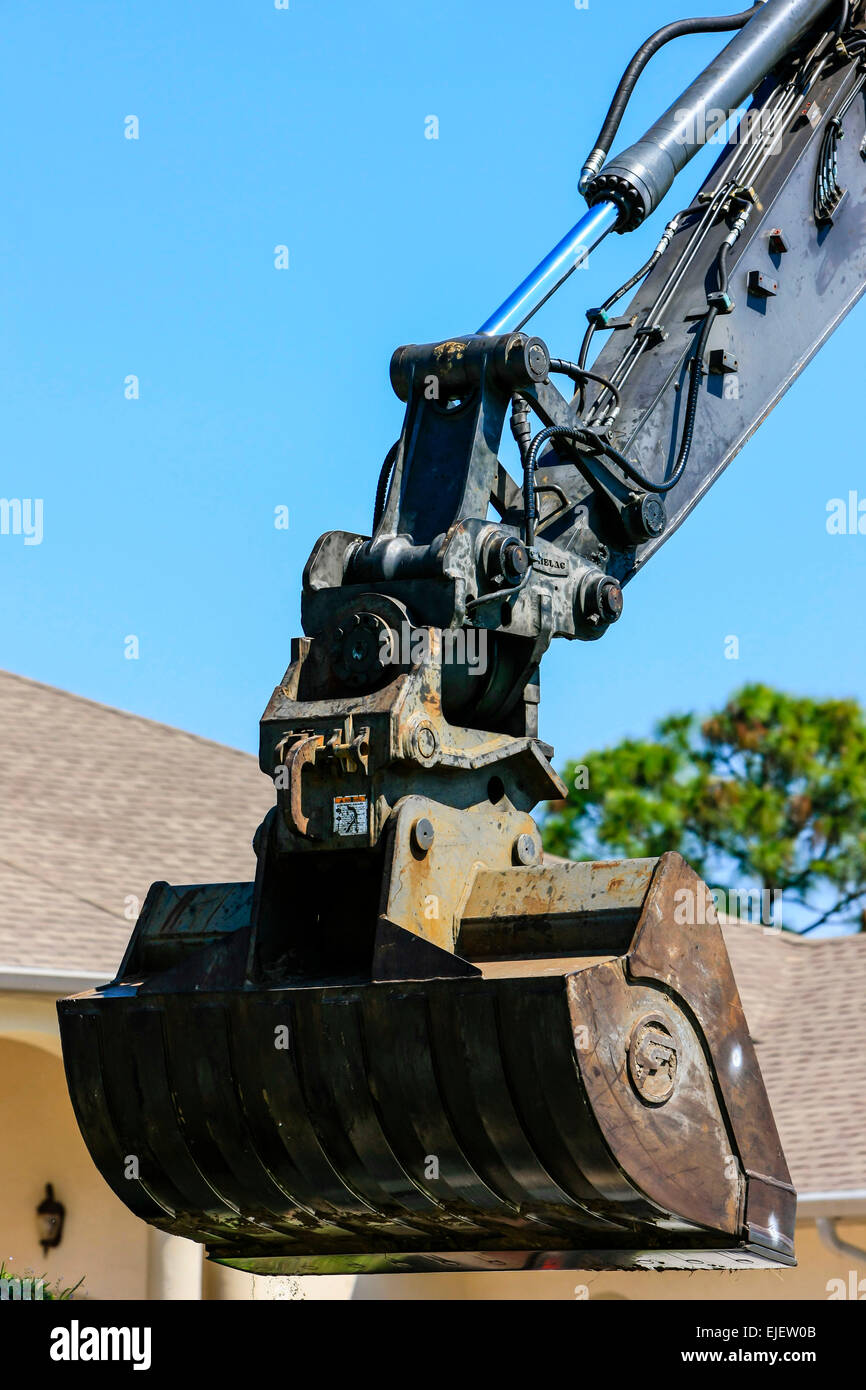 A heavy construction backhoe digger bucket and hydaulics system of the ...