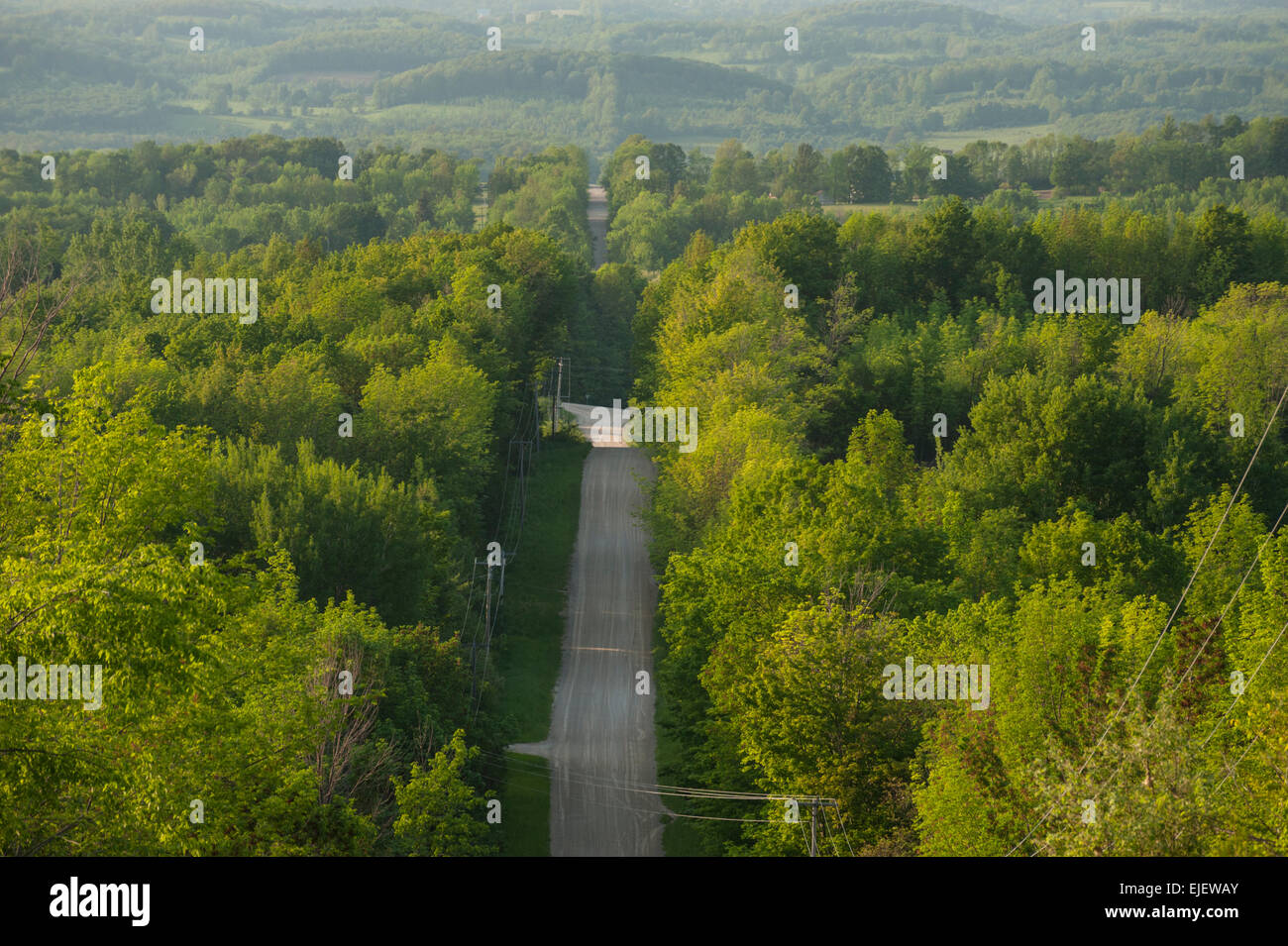 Road over hills hi-res stock photography and images - Alamy
