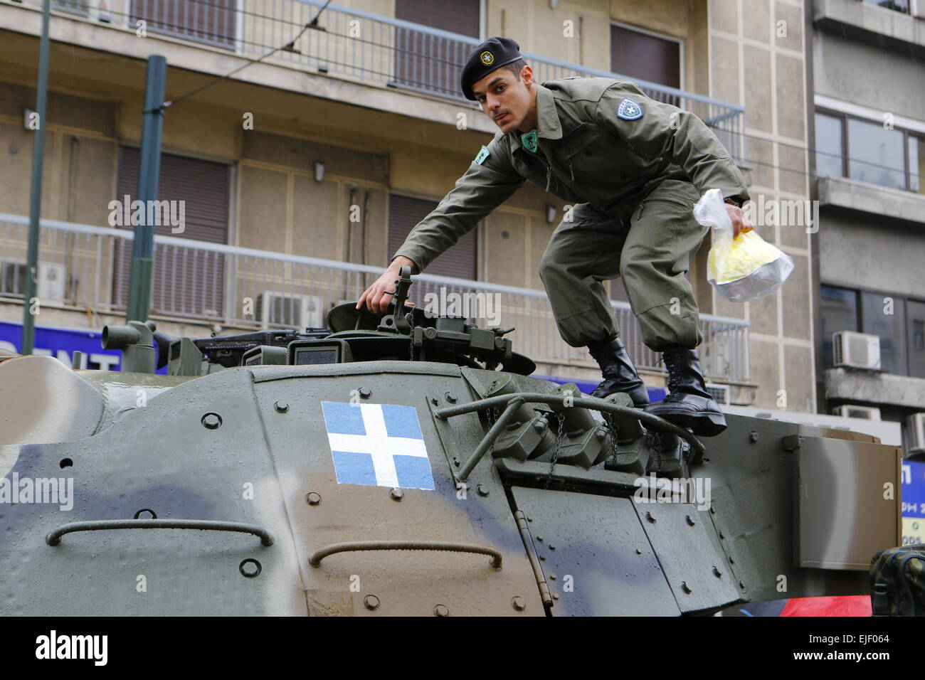 Athens, Greece. 25th Mar, 2015. A soldier puts the last thing into a ...