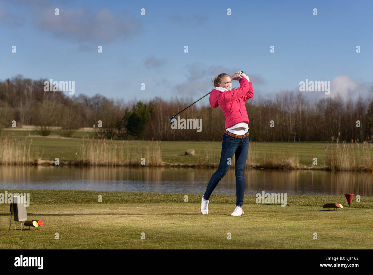 Girl Hitting Golf Ball At Topgolf at Carolyn Mendenhall blog