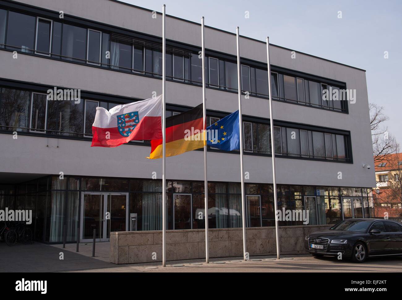 Erfurt, Germany. 25th Mar, 2015. The flags of the State of Thuringia (L ...