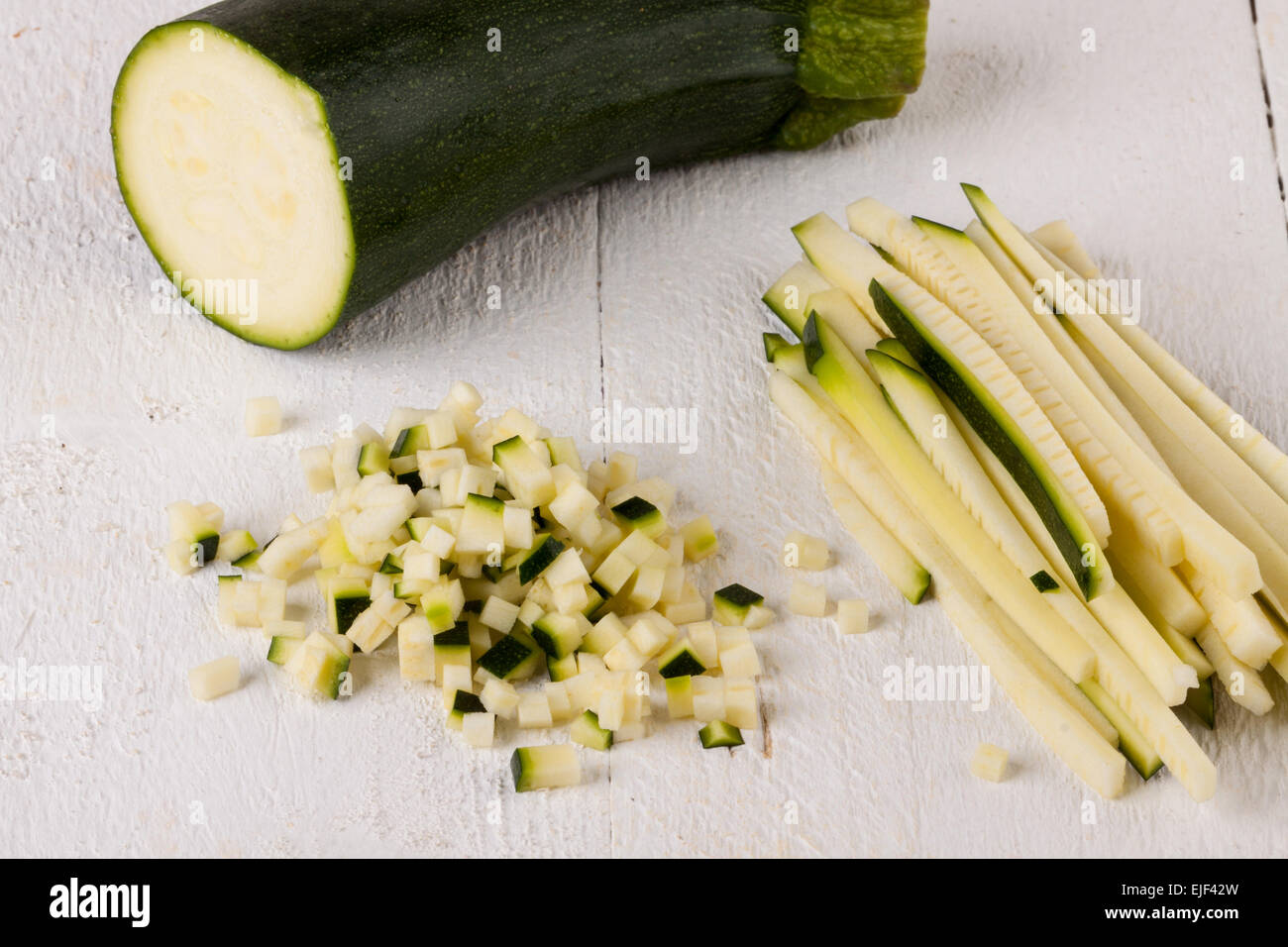 Fresh marrow or courgette cut into batons and diced into small cubes ...