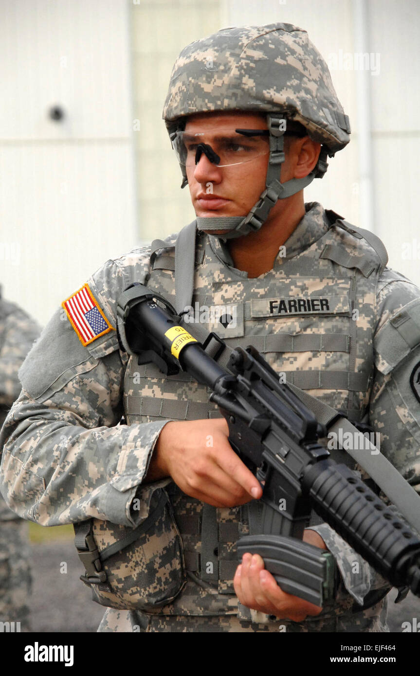 The U.S. Army Medical Command's Spc. Daniel Farrier awaits instructions ...