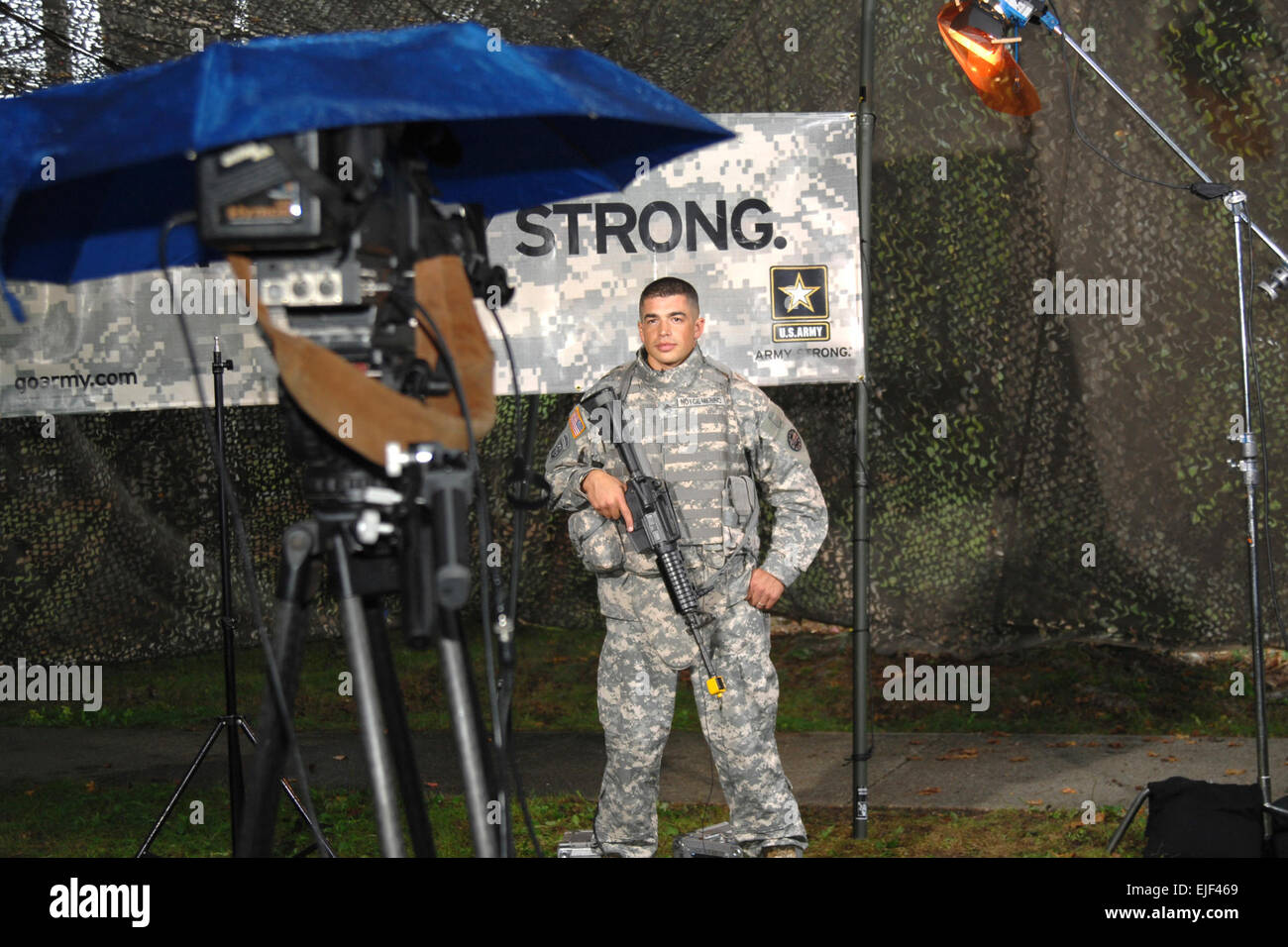 Staff Sgt. Michael Noyce Merino conducting a Television interview with ...