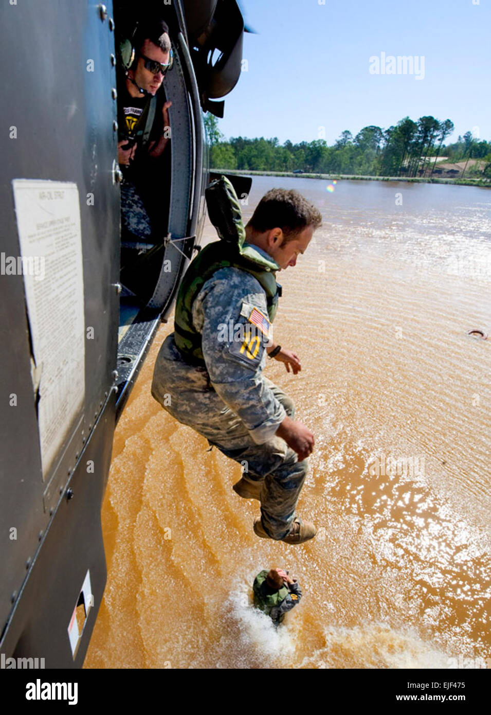 Staff Sgt. Thomas West, 6th Ranger Training Battalion, jumps from a ...