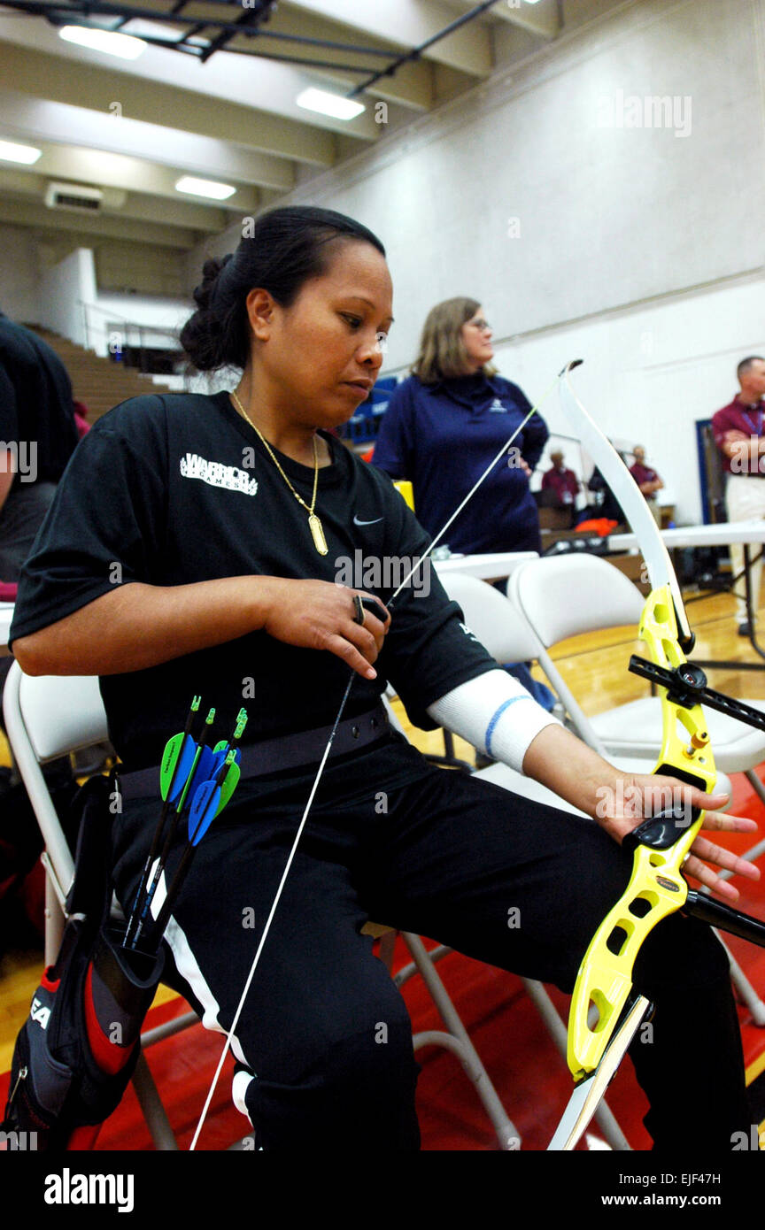 Sgt. Lilina Benning, a lower leg amputee, gets ready for archery ...