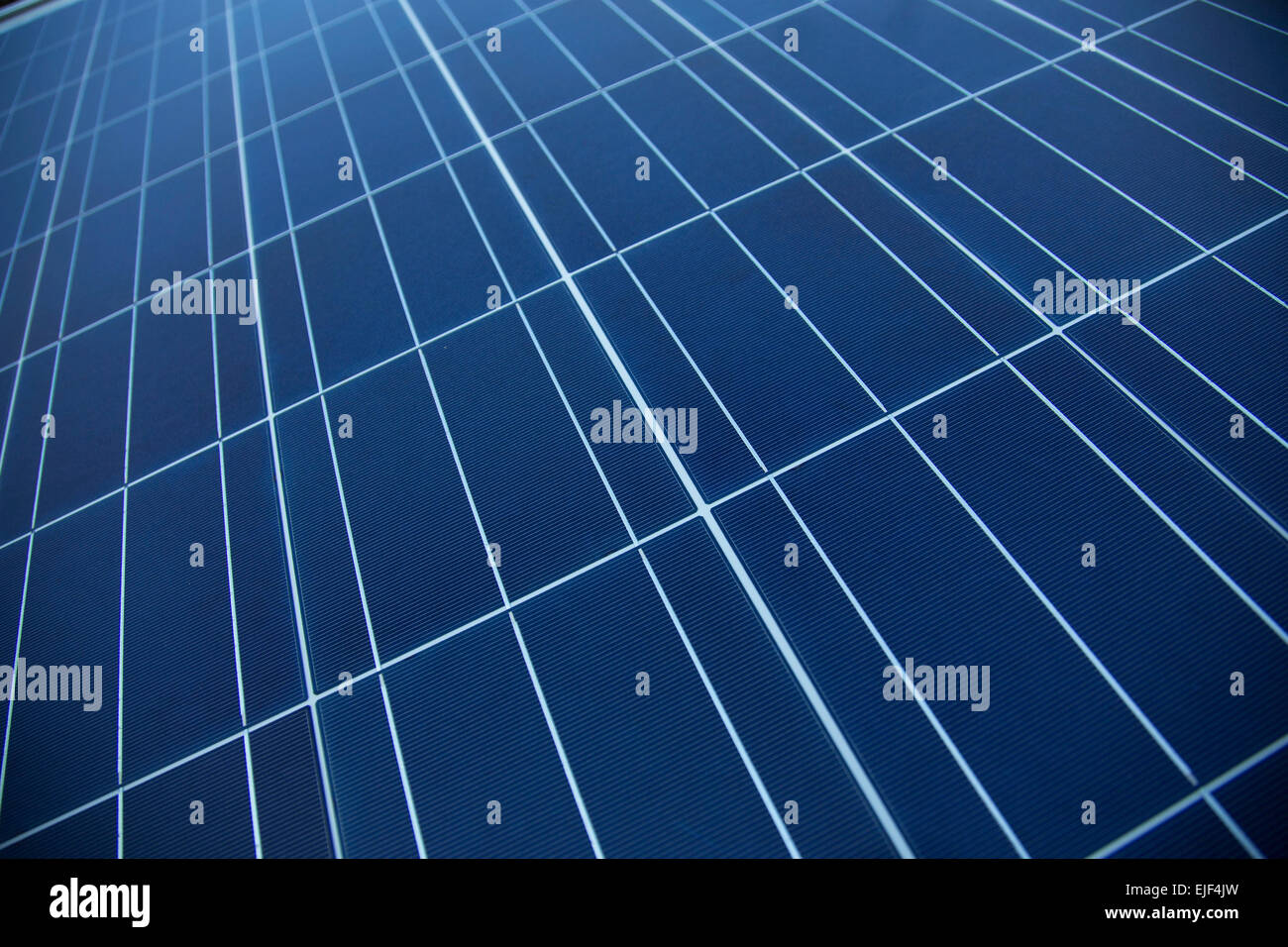 Solar panels being installed as part of a renewable green energy policy ...