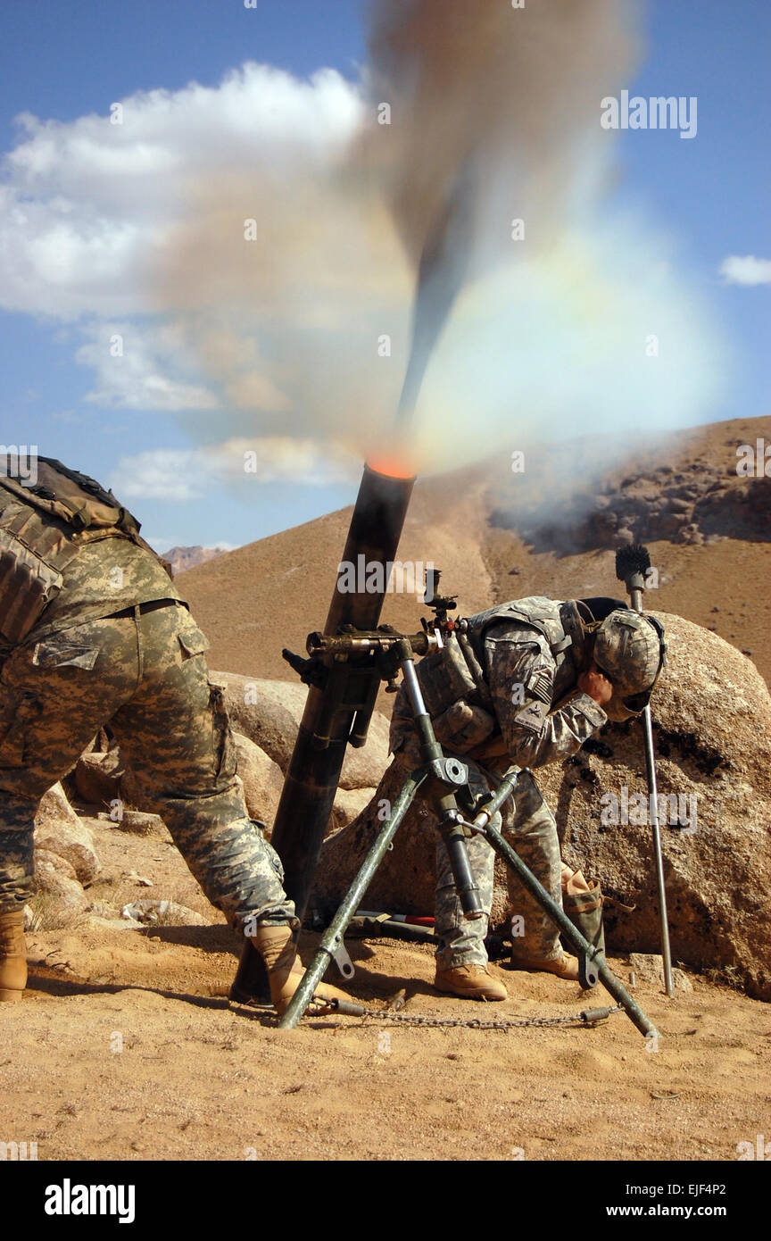 From left, U.S. Army Pfc. Jerry Cleveland and Spc. Brett Mitchell, both ...