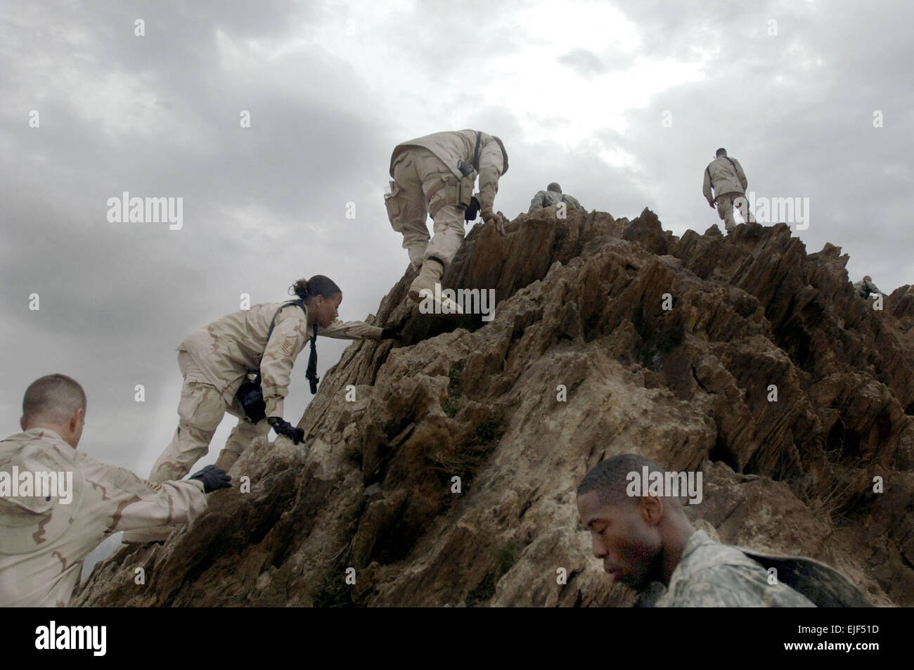 THE GHAR — U.S. Air Force airmen and Army soldiers climb down a 1,500 ...