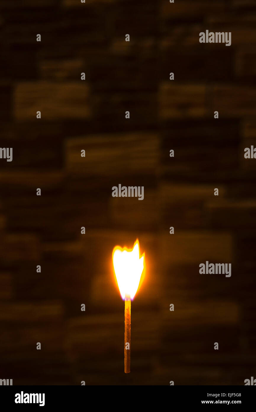 Ignited matchstick in the air Stock Photo - Alamy