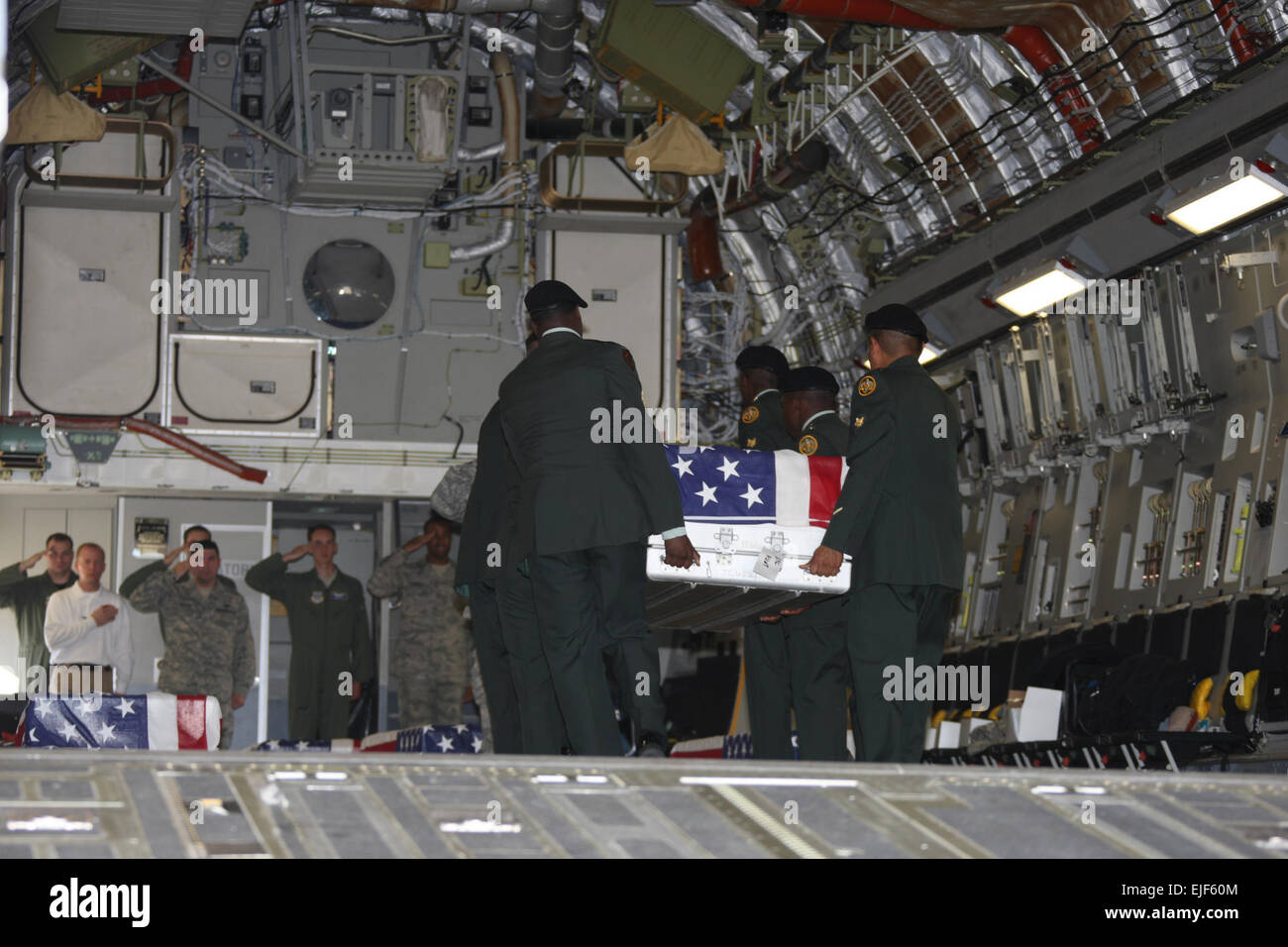 FORT HOOD, Texas- The air crew salutes as the remains of Spc. Jason D ...