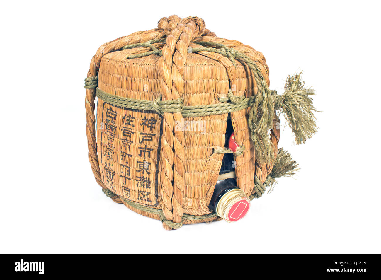 Traditional wicker container of sake isolated on white Stock Photo - Alamy