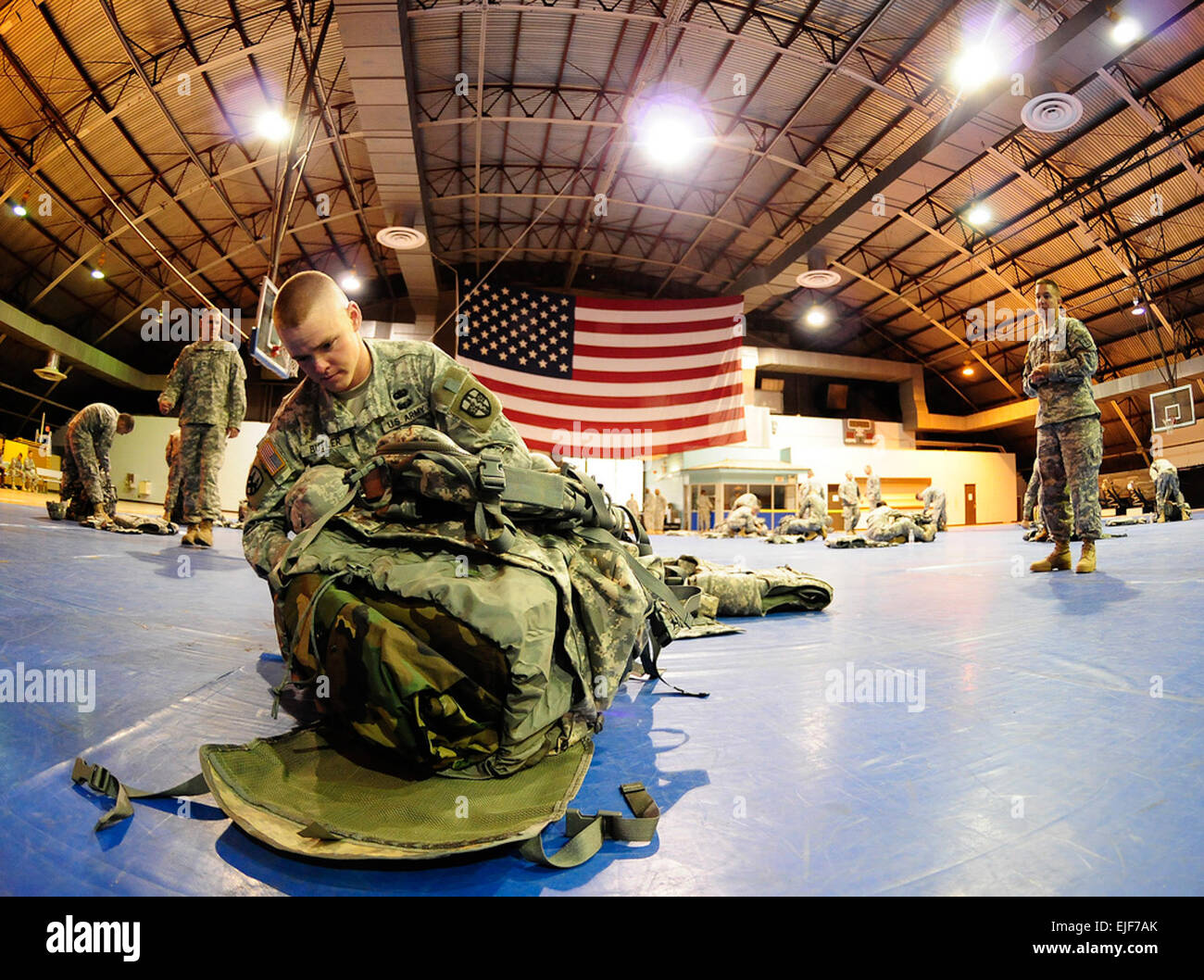 Staff Sgt. Aaron Butler, the Army Reserve NCO of the Year, packs his ...