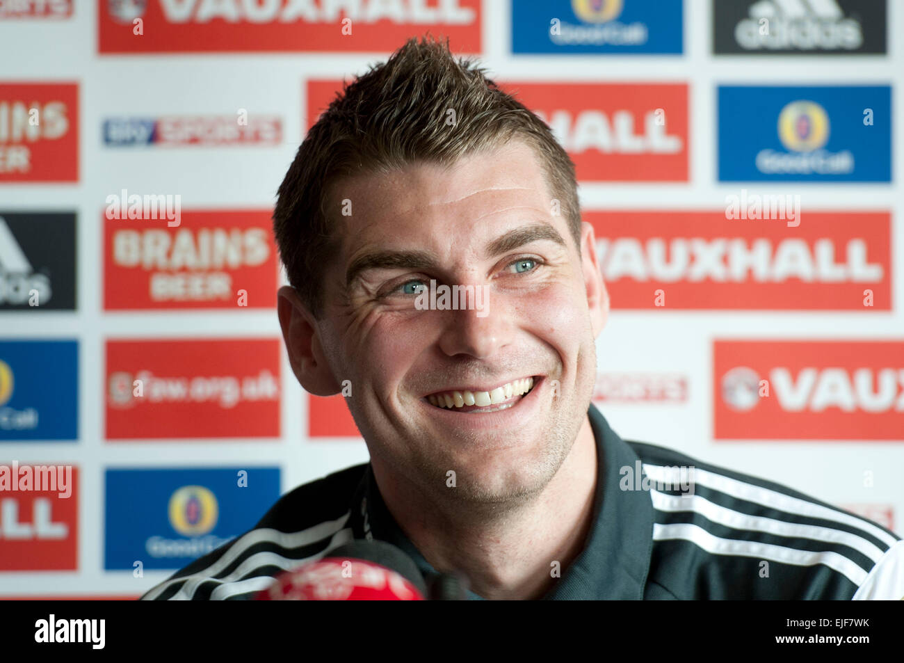 Cardiff, Wales, UK. 25th Mar, 2015. Sam Vokes speaking at the Football ...
